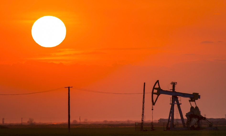 Oil and gas well profiled on sunset sky - PESA - Petroleum Exploration ...